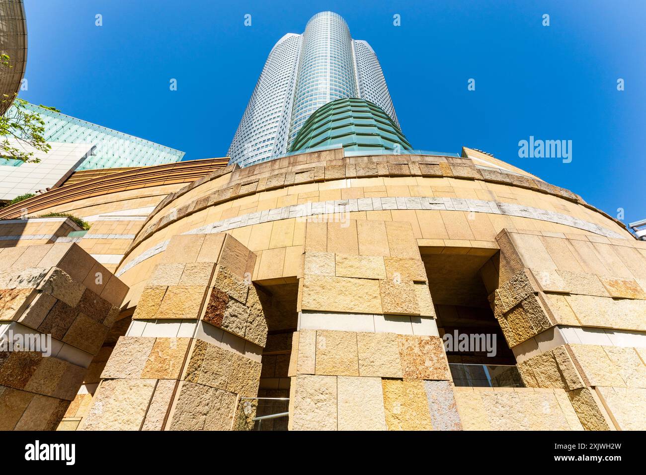 The Mori Tower, with the Mori art Museum entrance building in front ...