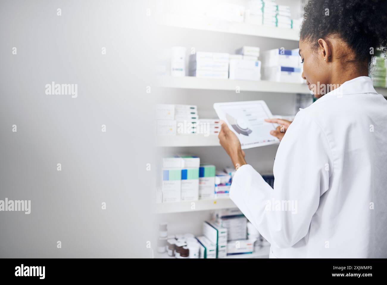 Woman, online or tablet with screen in pharmacy for stock inspection ...
