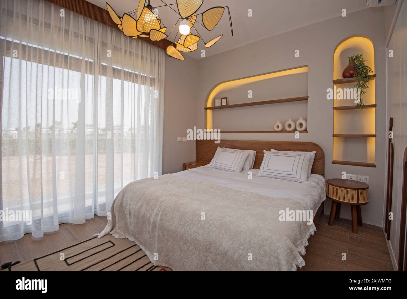 Interior design decor furnishing of luxury show home bedroom showing ...