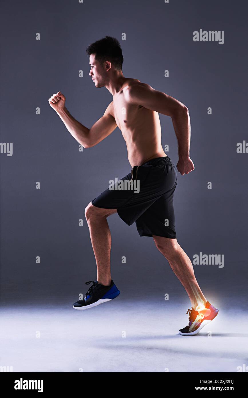 Man, ankle and injury of exercise in studio, anatomy of leg or foot and ...