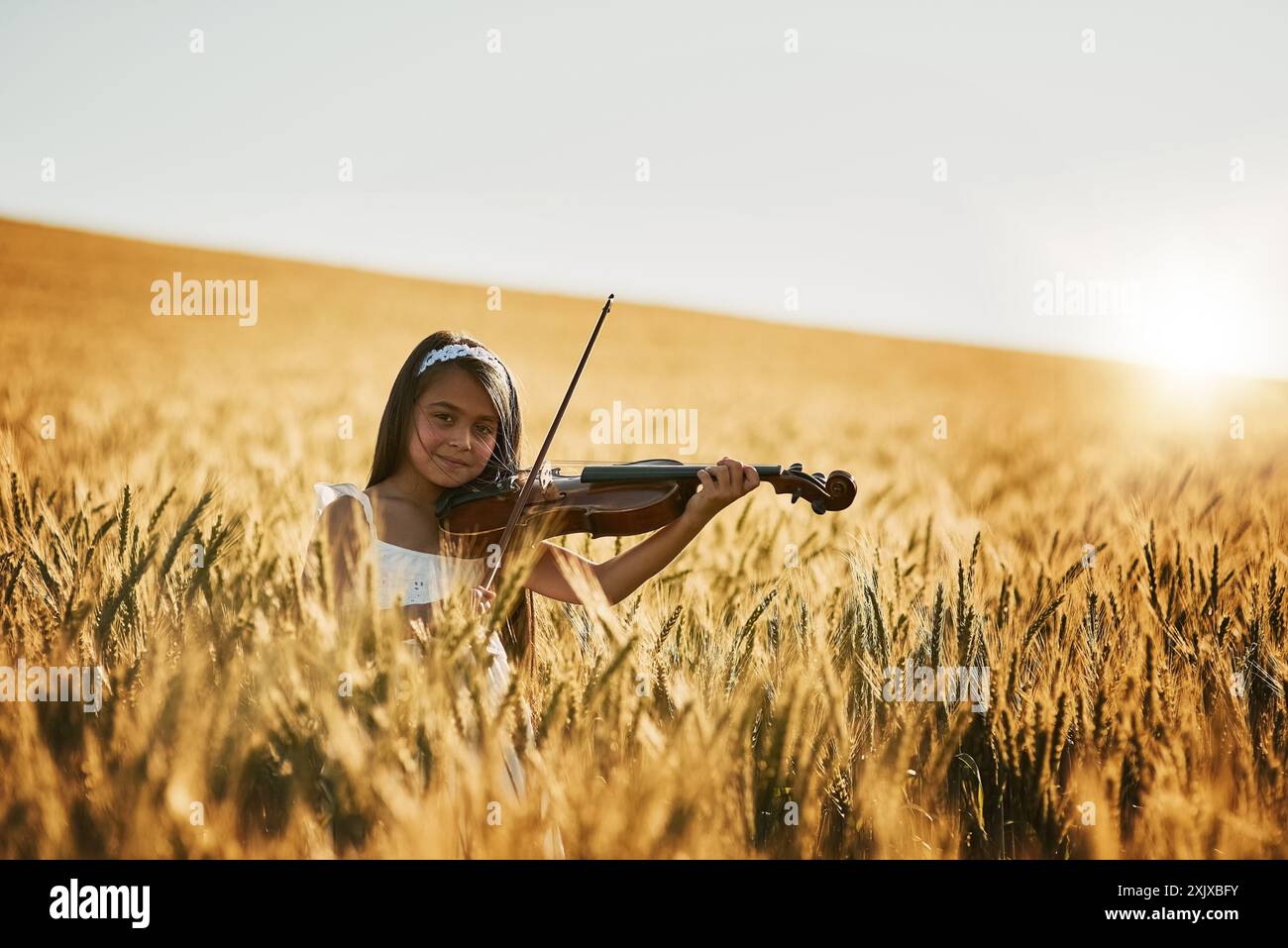 Girl violin in field hi-res stock photography and images - Alamy