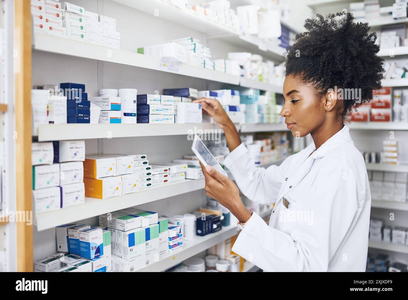 African woman, check or tablet with screen in pharmacy for stock ...