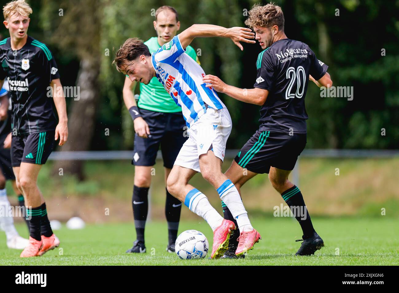 Garderen, Netherlands. 19th July, 2024. Espen van Ee of SC Heerenveen Dylan Ruward of PEC Zwolle ...