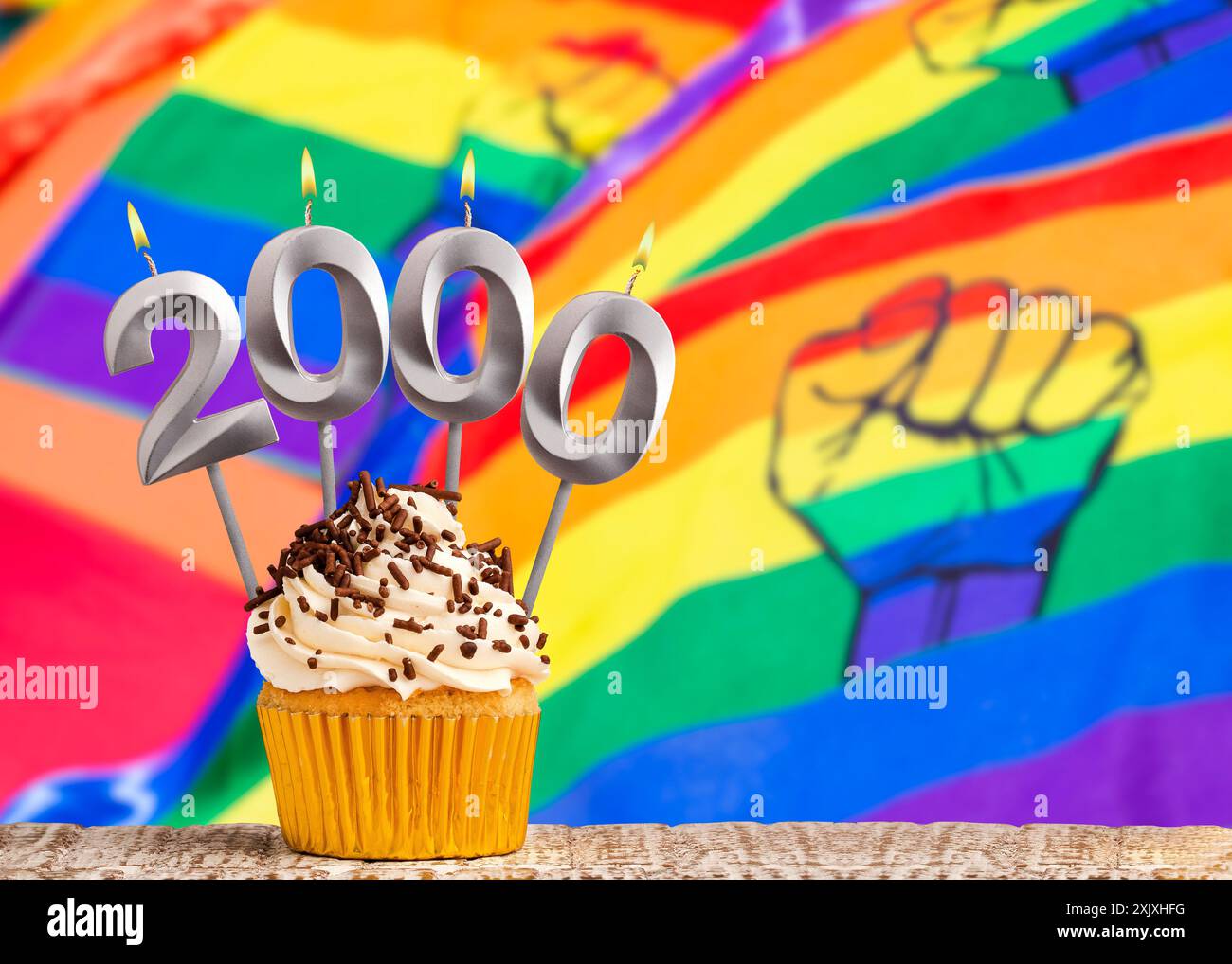 Birthday candle number 2000 - Gay march flag background Stock Photo - Alamy
