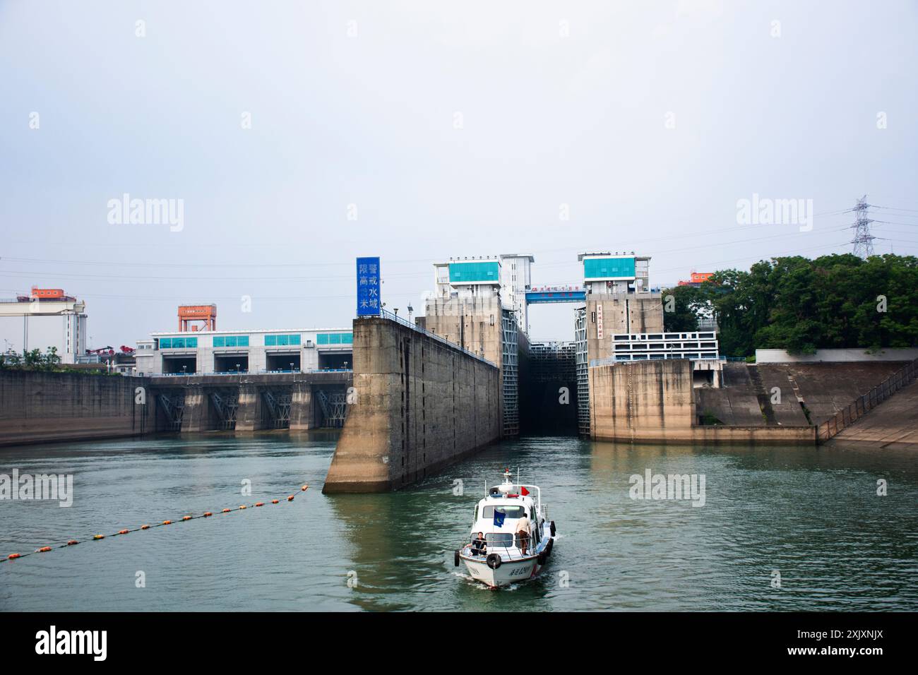 Three Gorges Dam spillways and navigation lock vessel traffic boat door ...
