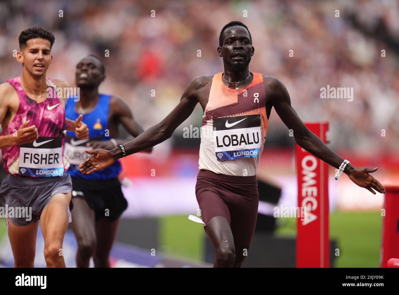 Dominic Lokinyomo Lobalu winning the Men's 3000m final during the ...
