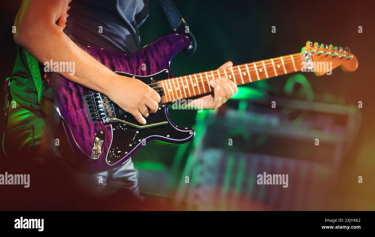 Detail of electric guitar player at a pop concert Stock Photo - Alamy