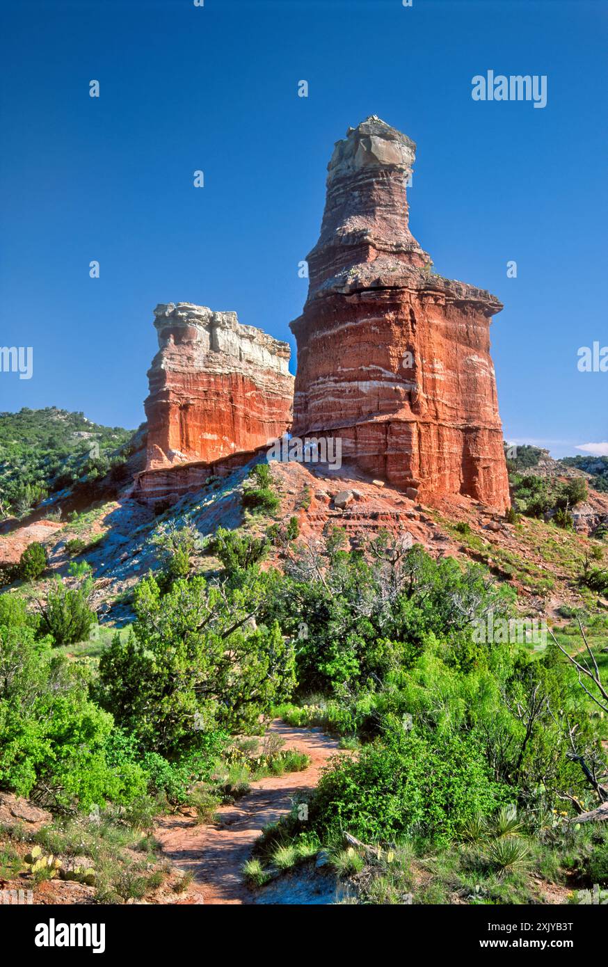 The Lighthouse Rock, hikers relaxing at its base, over Lighthouse Trail ...
