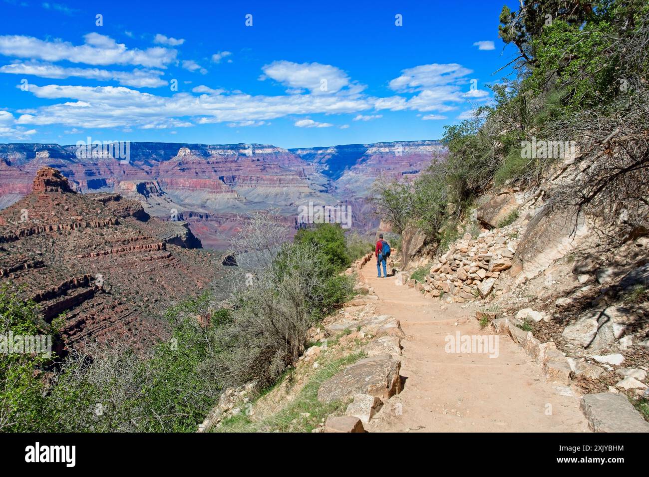 Colorful eroded rock formations below the rim reward hiking down Bright ...