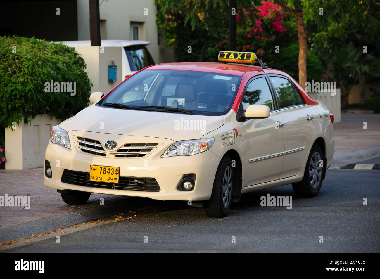 UAE, Dubai, 14th May 2011, a taxi parked on the road waiting for a ...