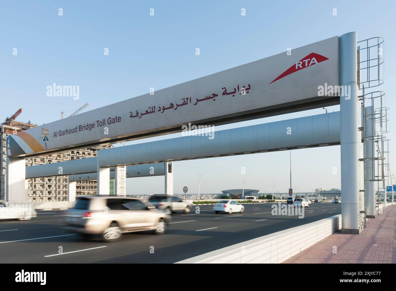 United Arab Emirates, Dubai, 21st Mai 2011, Vehicles pass under a Salik ...