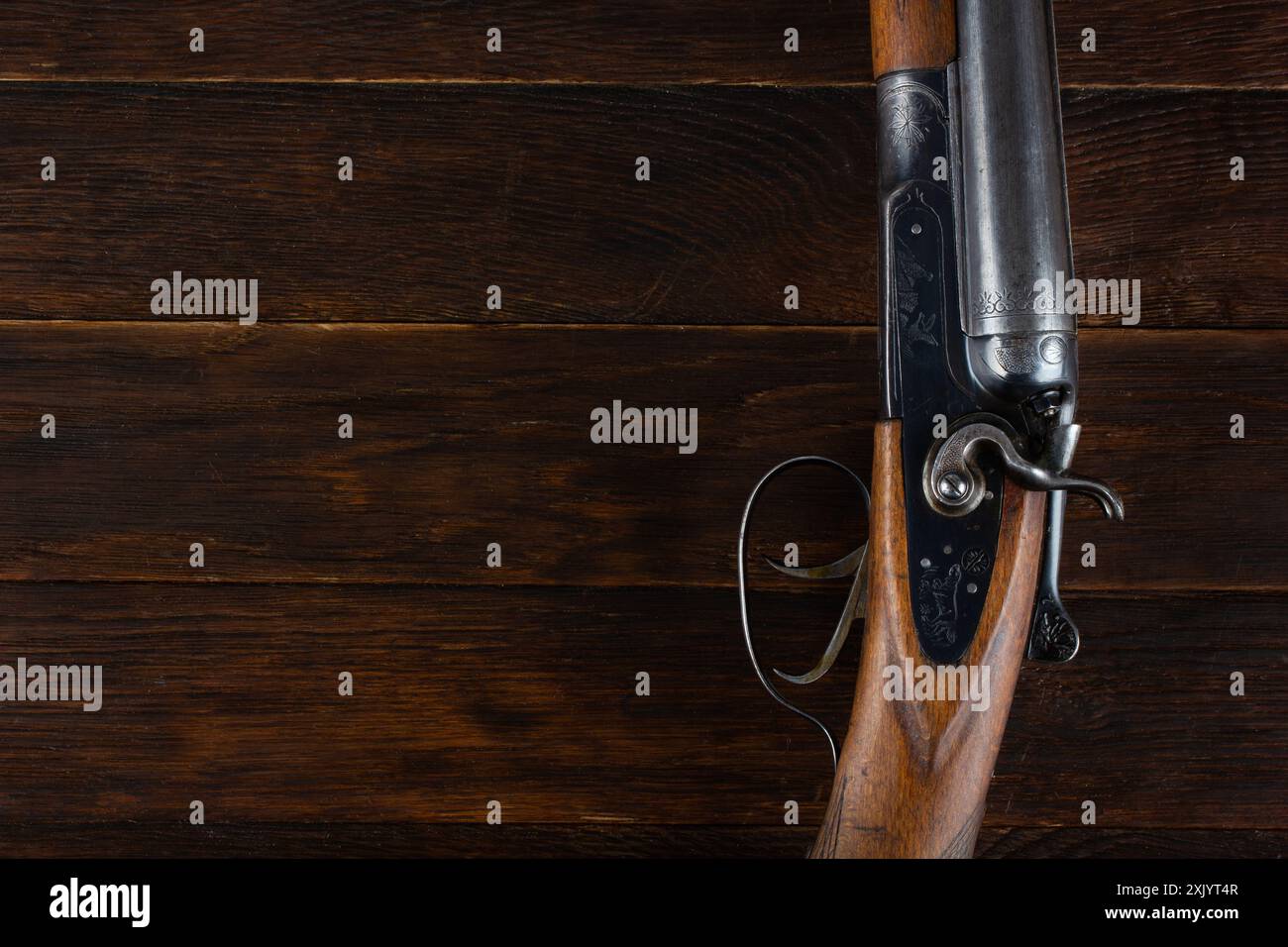 double barreled side shotgun on wooden table Stock Photo - Alamy