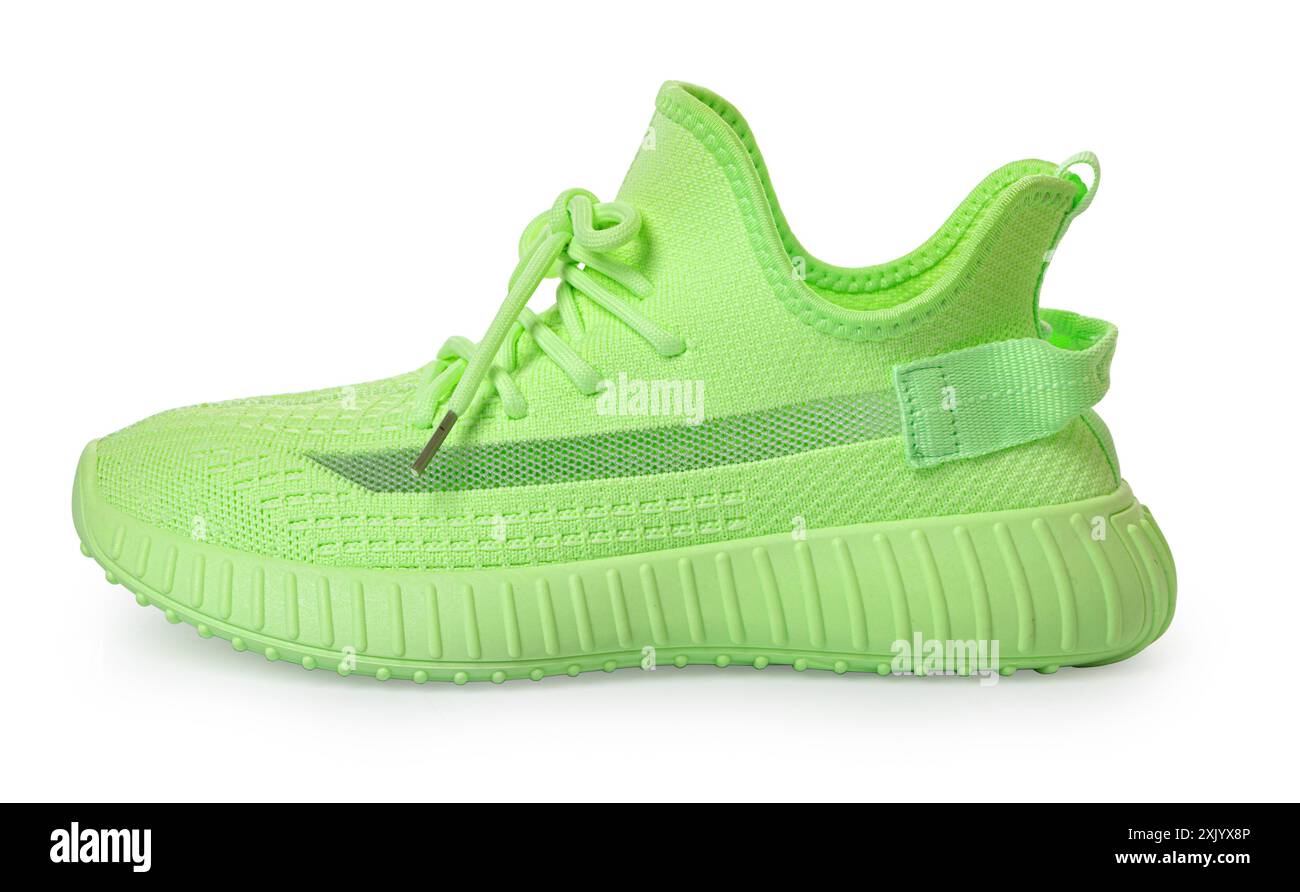 Modern sneakers isolated on white background. Light green color, with ...