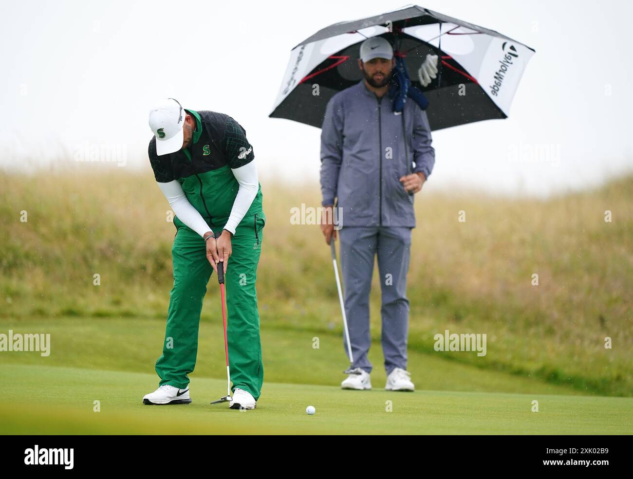 South Africa's Dean Burmester and USA's Scottie Scheffler on the 3rd ...
