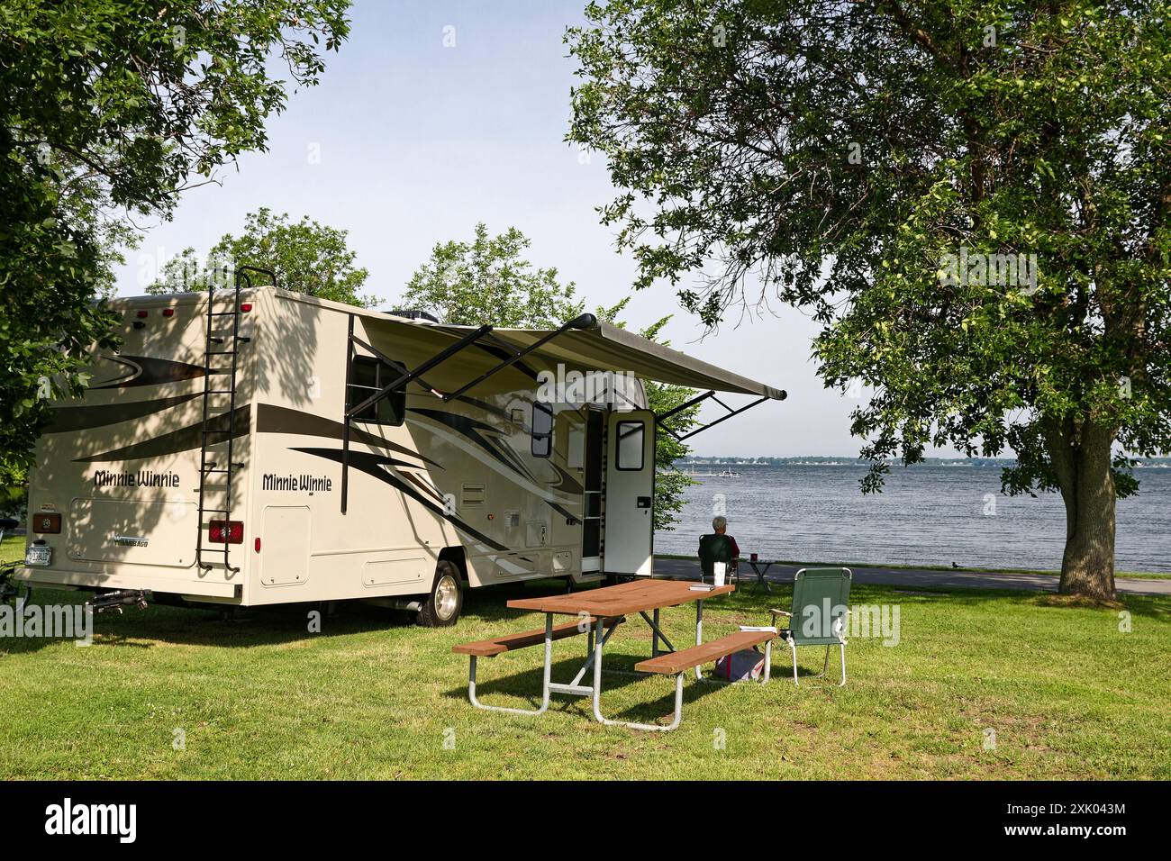 campsite, grassy, on water, Chaumont Bay, man sitting outside, picnic ...