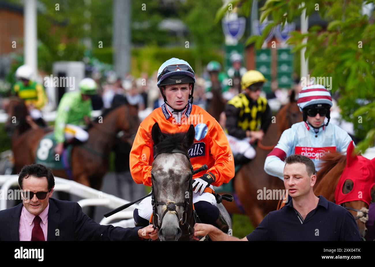Caburn and jockey Dylan Hogan before the Weatherbys Super Sprint Stakes ...