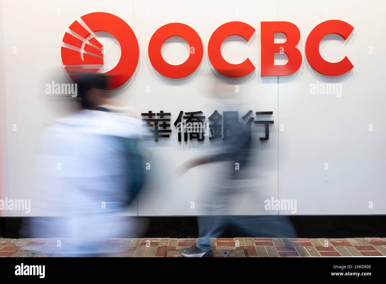 May 3, 2024, Hong Kong, China: Pedestrians walk past the Singaporean ...