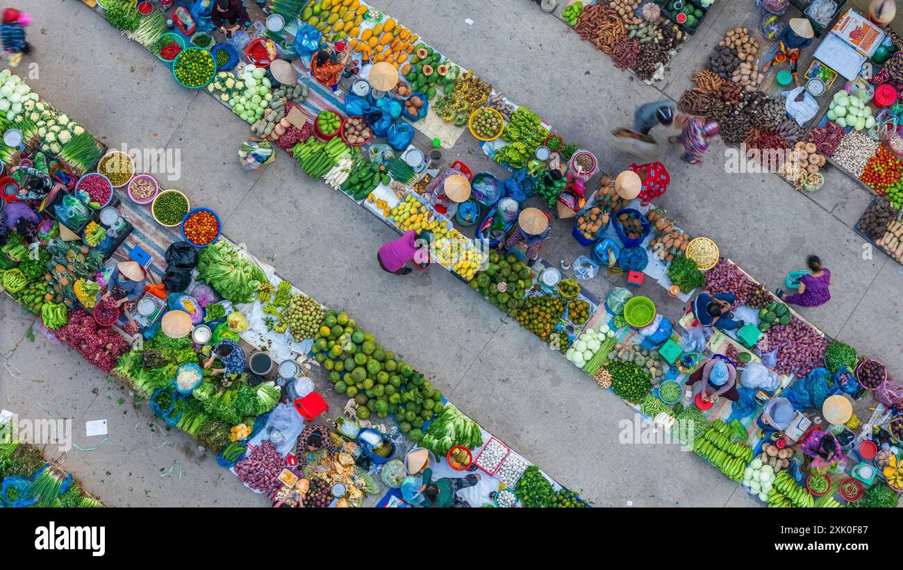 Aerial view of busy local daily life of the morning local market in Vi ...