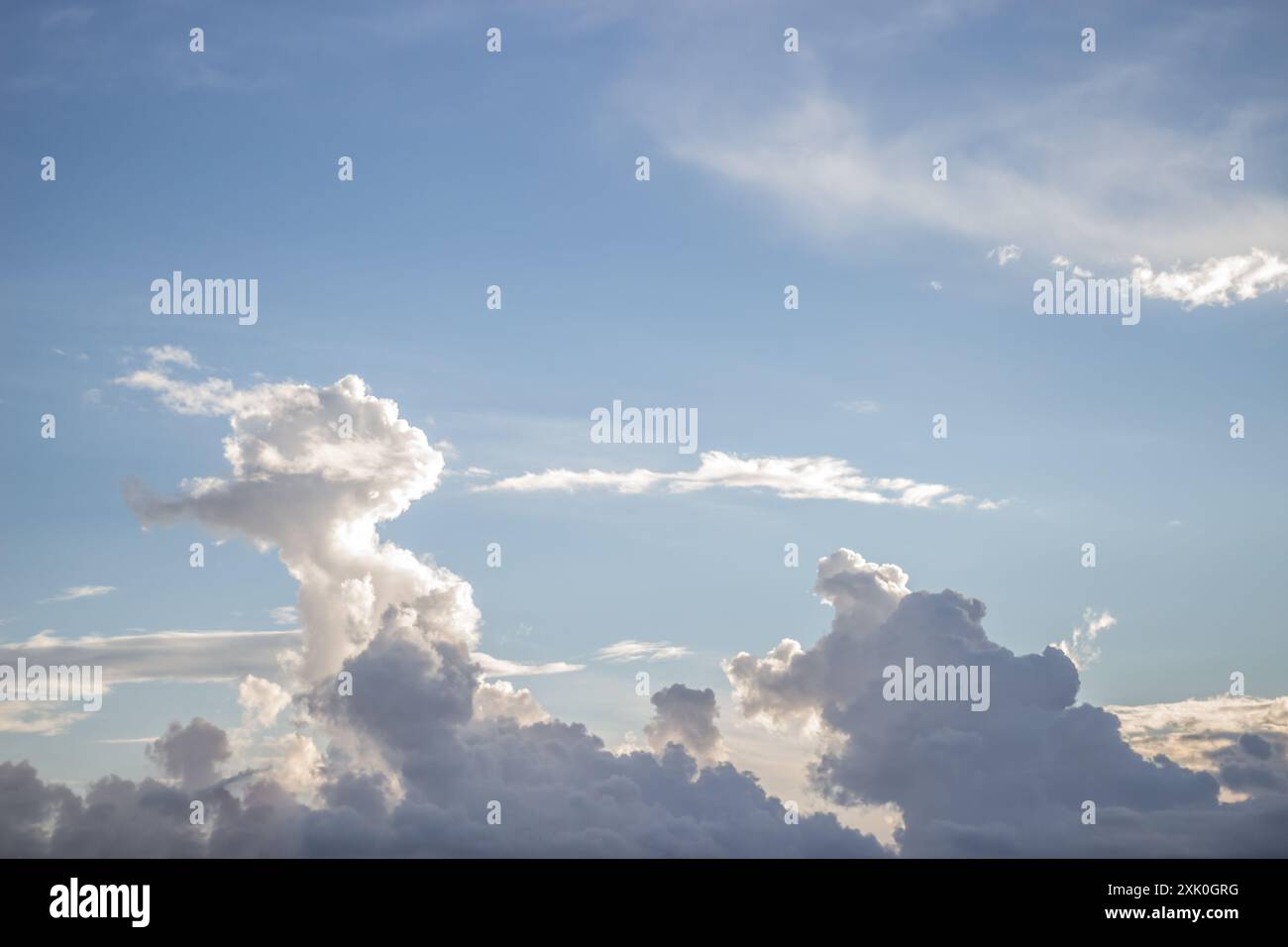 White clouds drift across blue hi-res stock photography and images - Alamy