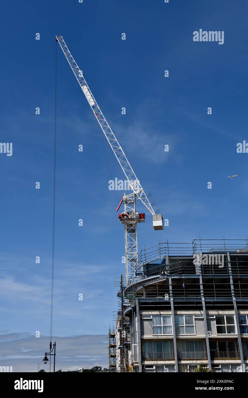 Tower Crane working on Building at Seaton Devon England uk Stock Photo ...