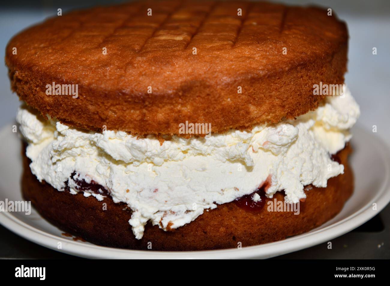 Homemade Victoria Sponge in the Kitchen Chard Somerset England uk Stock ...