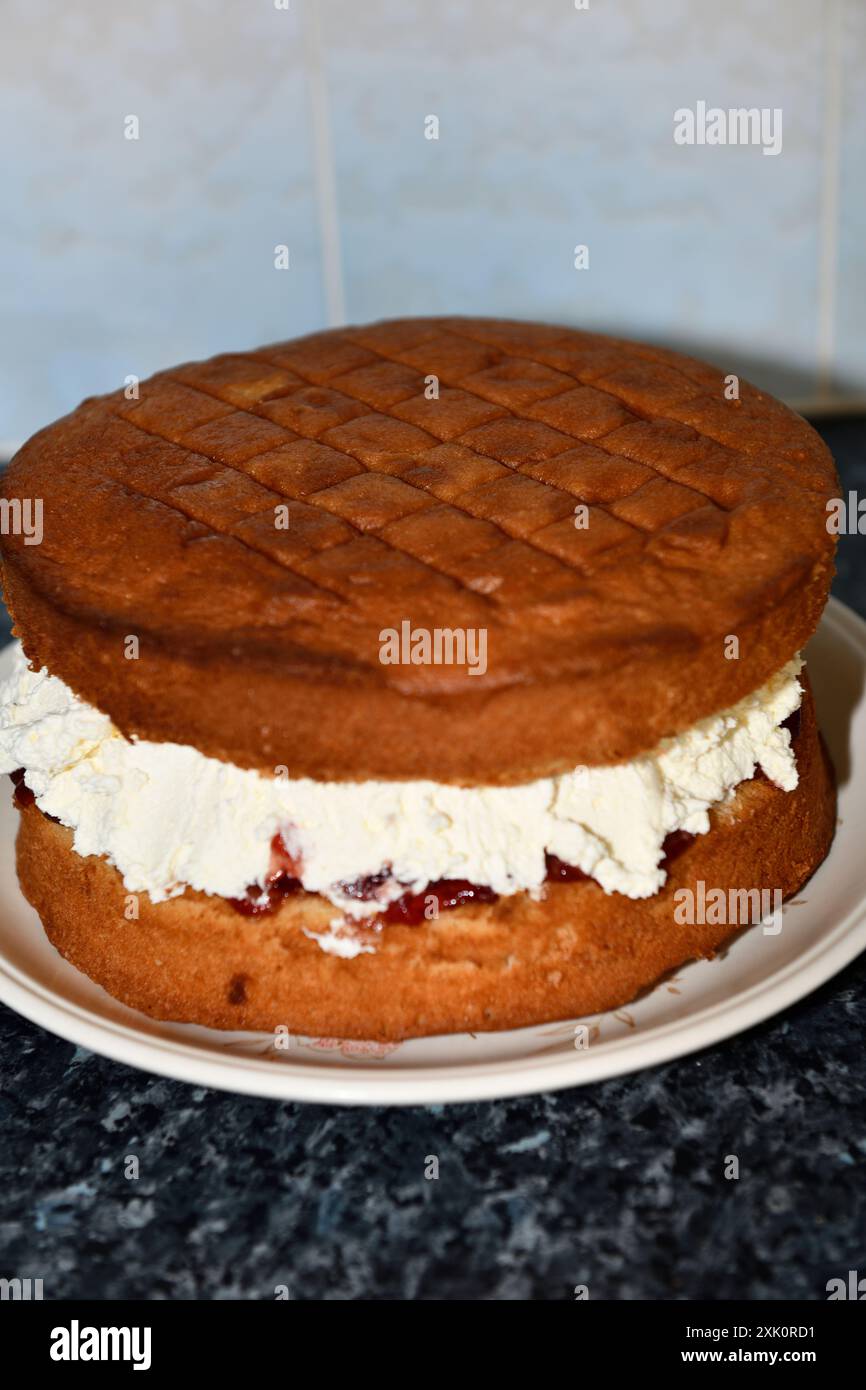 Homemade Victoria Sponge in the Kitchen Chard Somerset England uk Stock ...