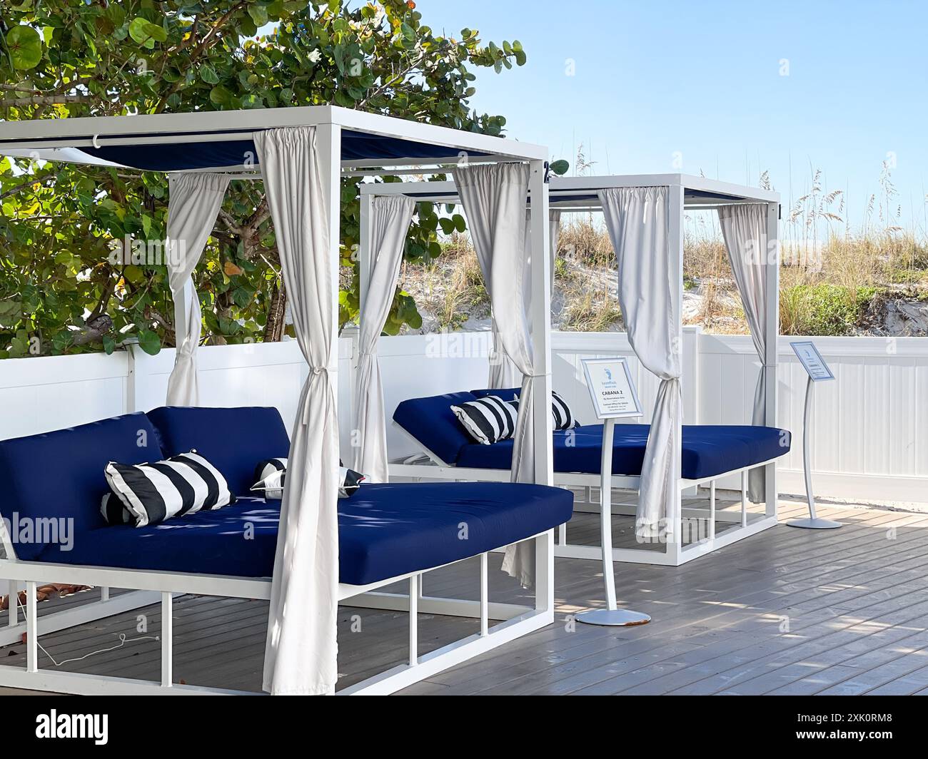 Blue and white cabanas at the beach in Florida Stock Photo - Alamy