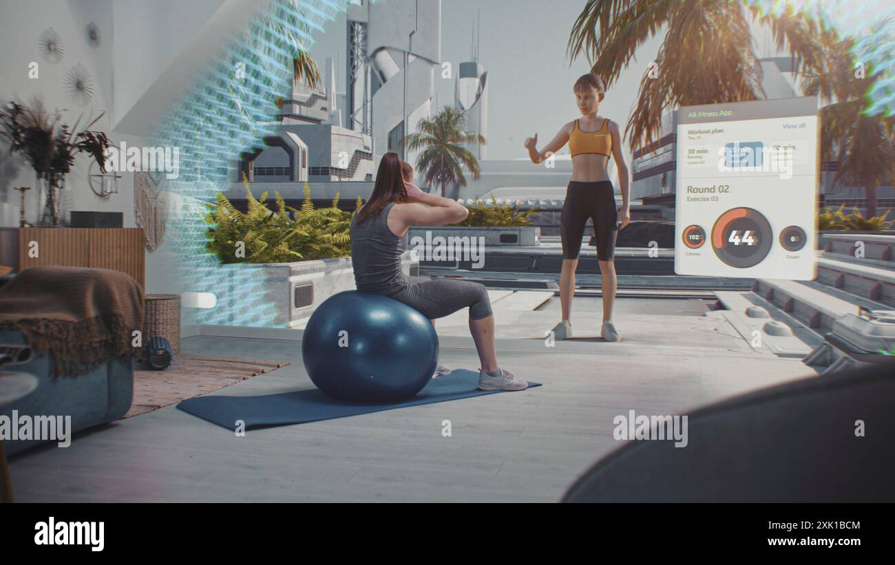 Female athlete exercises with fitball. VR screen with displayed virtual ...
