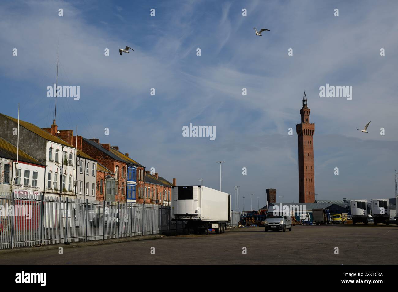 The iconic Grimsby Dock Tower, seen behind the boarded up and shuttered ...
