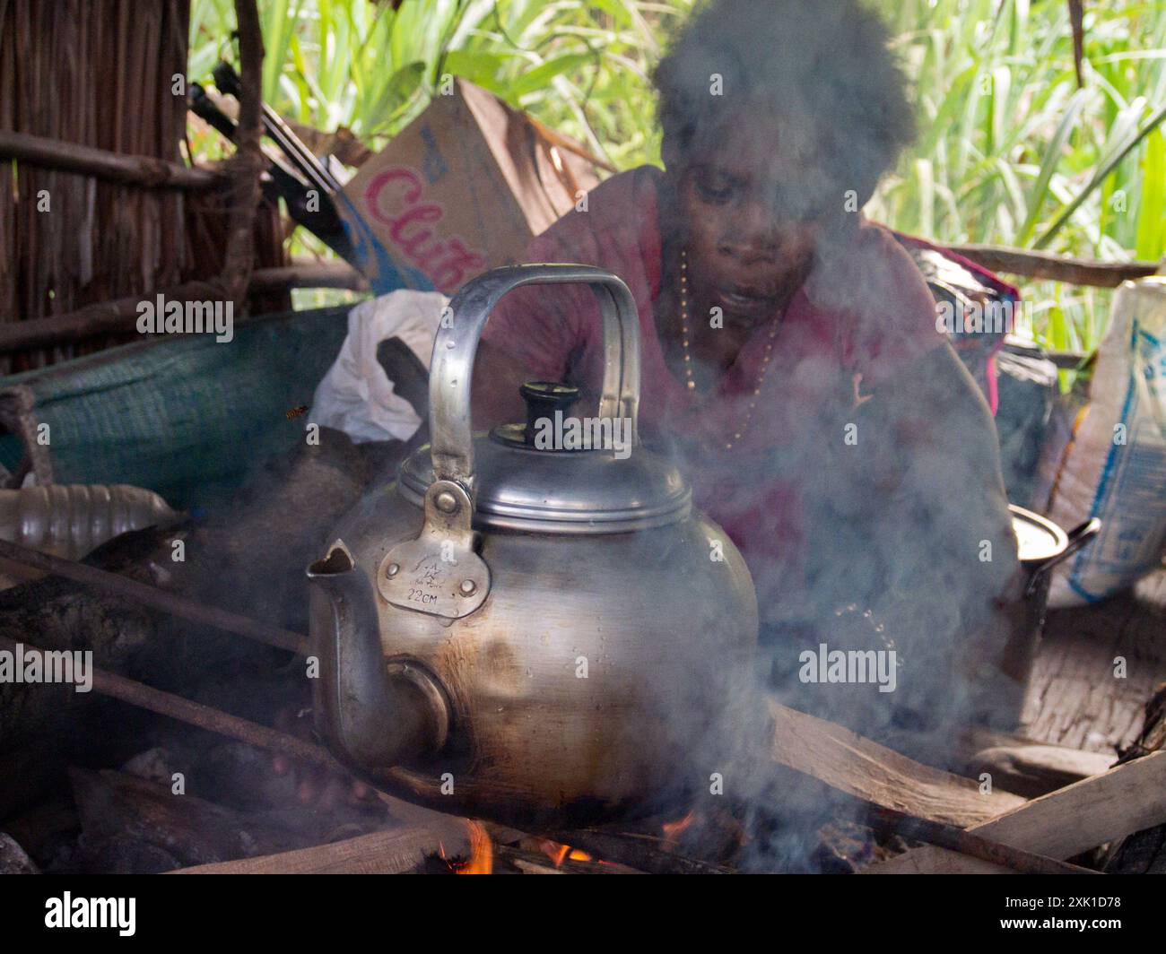 Jungle, Indonesia - January 13, 2015: Woman from the Korowai tribe ...