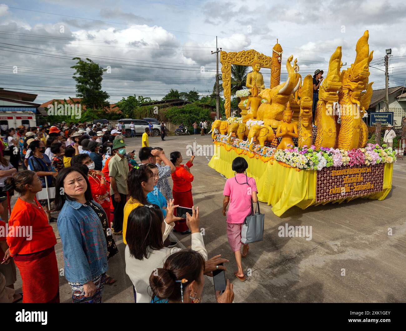 Thailand. 20th July, 2024. Tourists take pictures of the candle ...