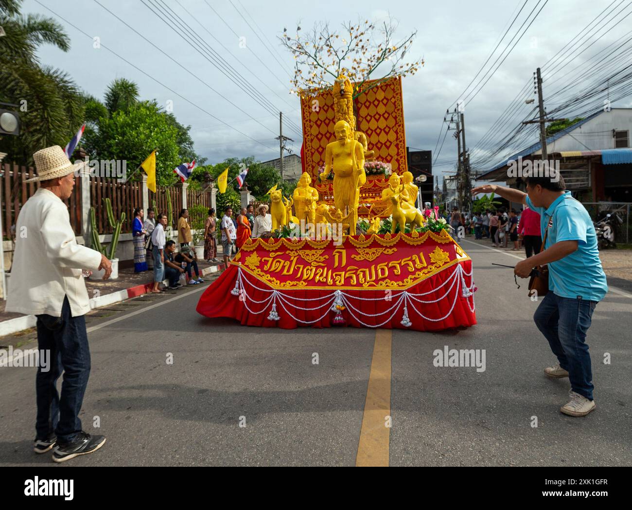 Thailand. 20th July, 2024. Thai villagers participate in the candle ...