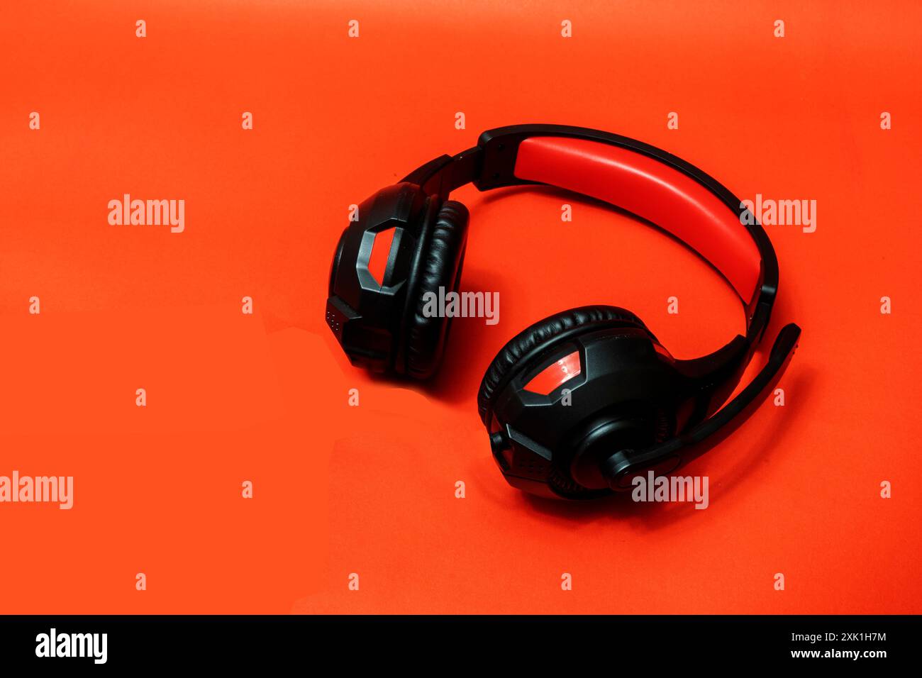 Wireless Over-Ear full size Headphones, Black leather isolated on red ...
