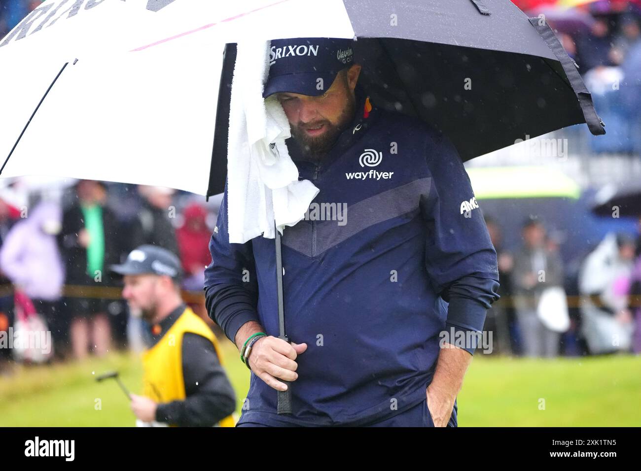 Ireland's Shane Lowry looks frustrated on the 14th green during day ...