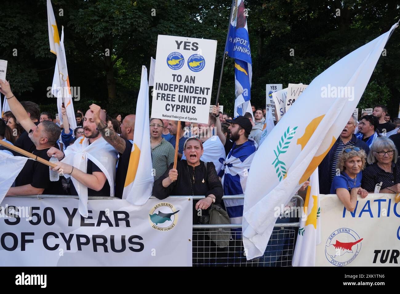 Members of The National Federation of Cypriots in the UK protest for a ...