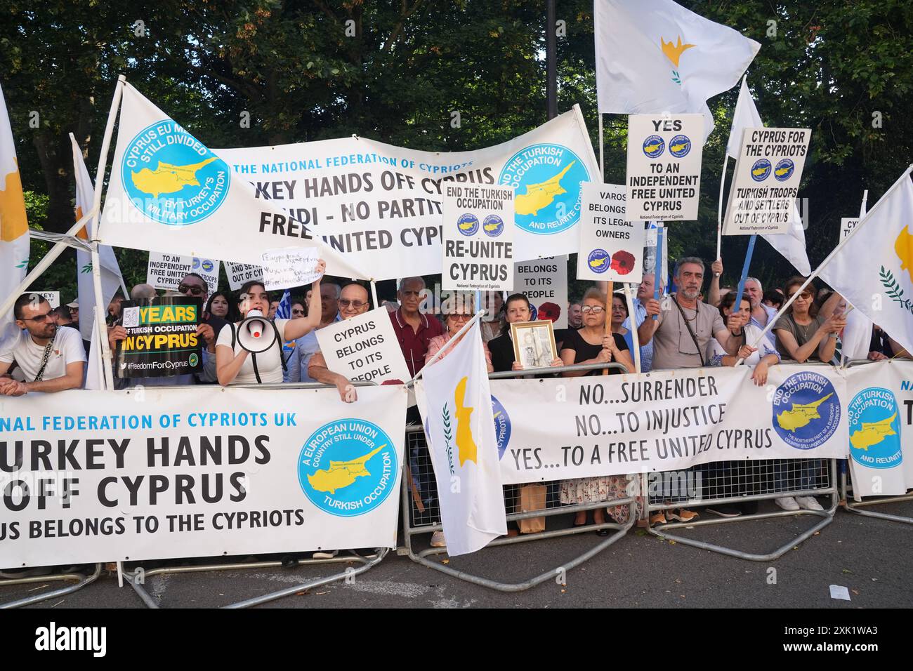 Members of The National Federation of Cypriots in the UK protest for a ...