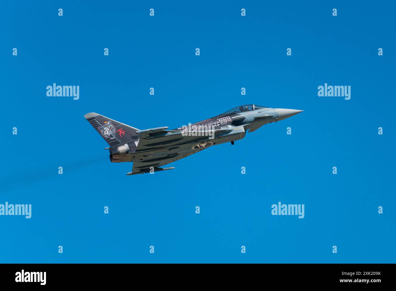 A German Air Force Eurofighter EF2000 performing at an airshow at RAF ...