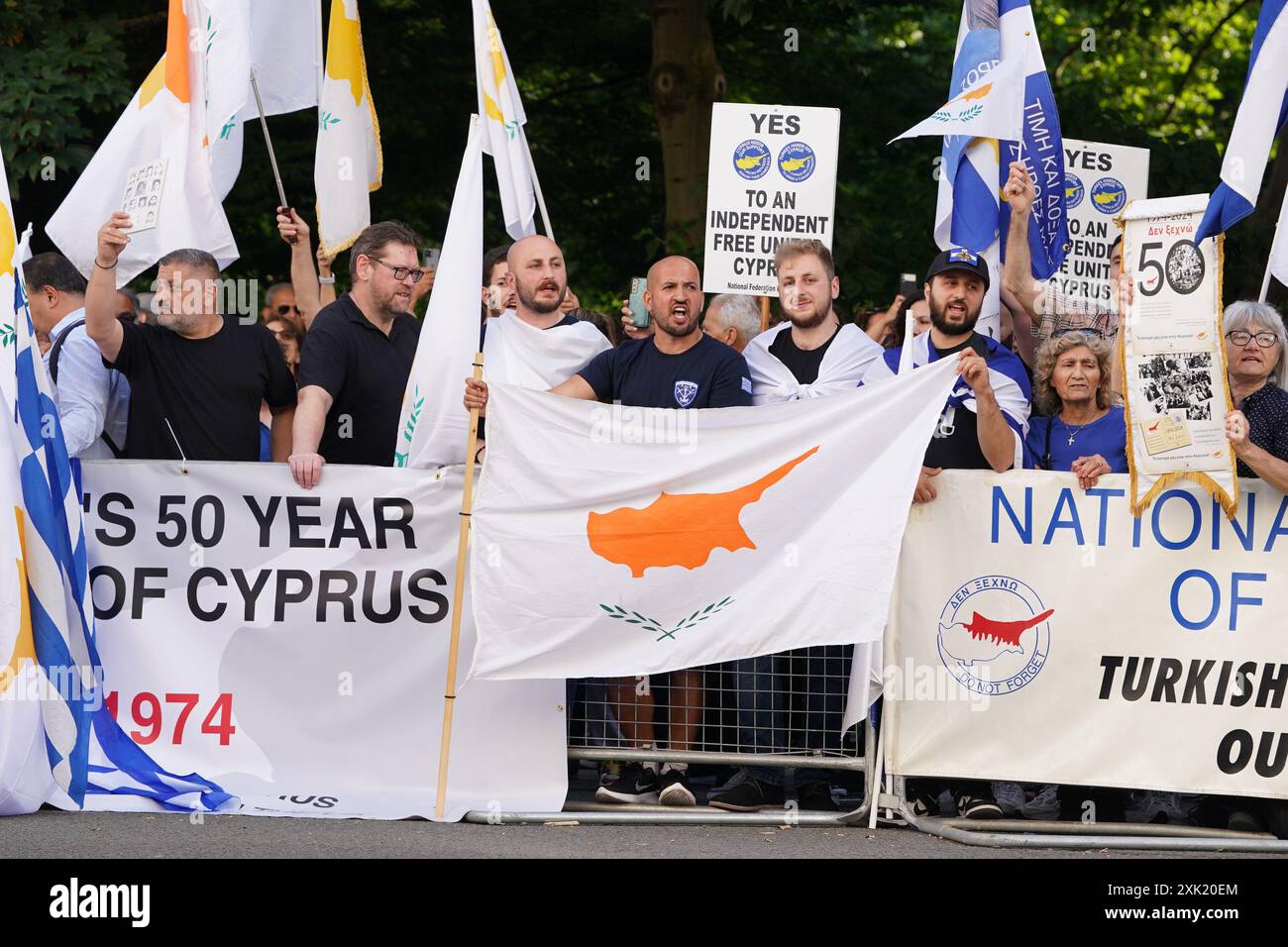 Members of The National Federation of Cypriots in the UK protest for a ...