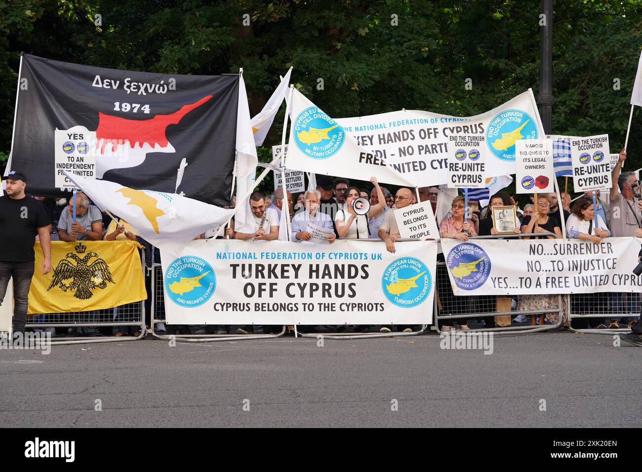 Members of The National Federation of Cypriots in the UK protest for a ...