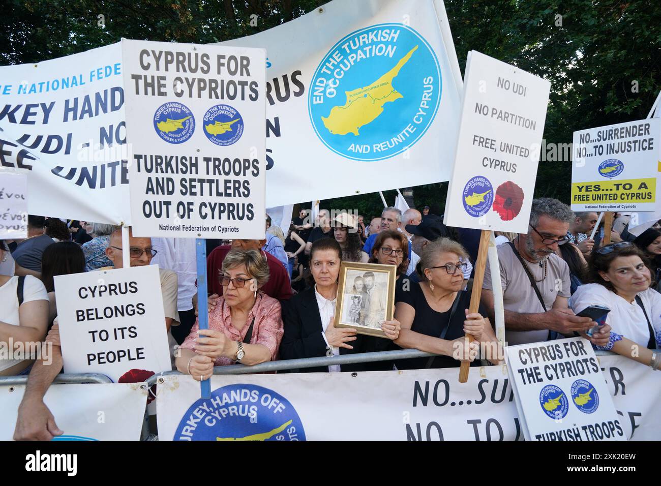 Members of The National Federation of Cypriots in the UK protest for a ...