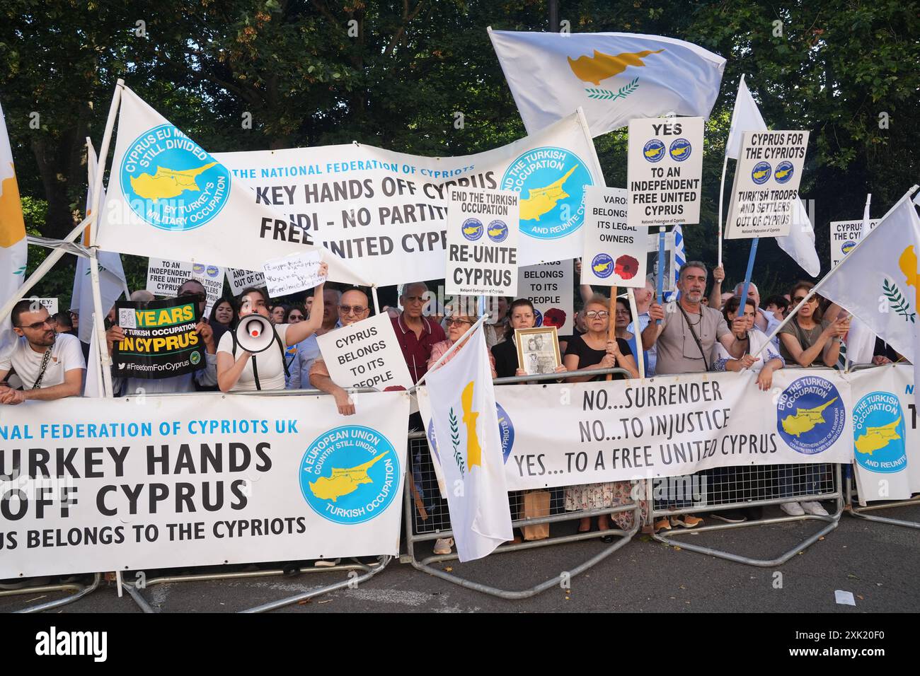 Members of The National Federation of Cypriots in the UK protest for a ...