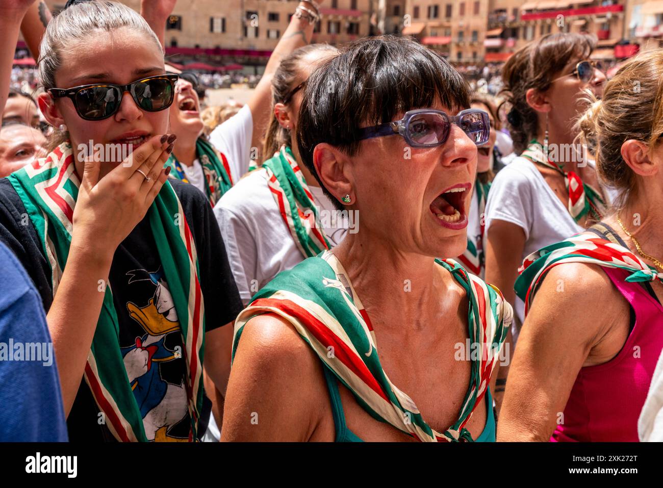 Female Members Of The Oca (Goose) Contrada Exit The Piazza Del Campo ...