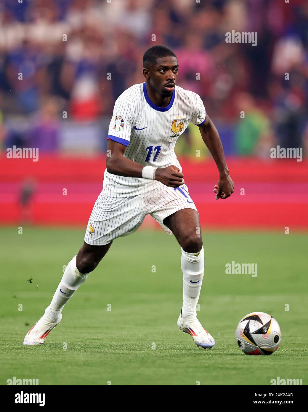 MUNICH, GERMANY - JULY 09: Ousmane Dembele of France runs with a ball ...
