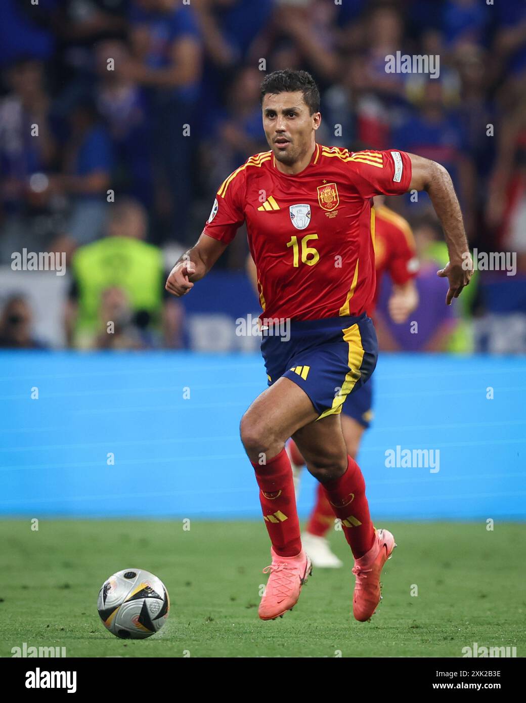 MUNICH, GERMANY - JULY 09: Rodri of Spain runs with a ball during the ...