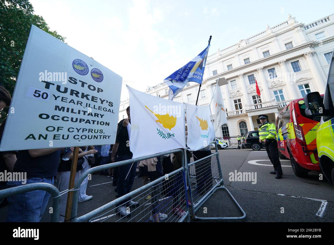 Members of The National Federation of Cypriots in the UK protest for a ...