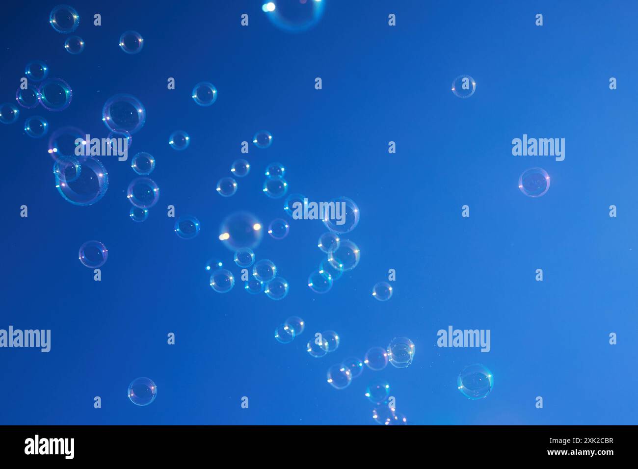 Delicate soap bubbles floating hi-res stock photography and images - Alamy