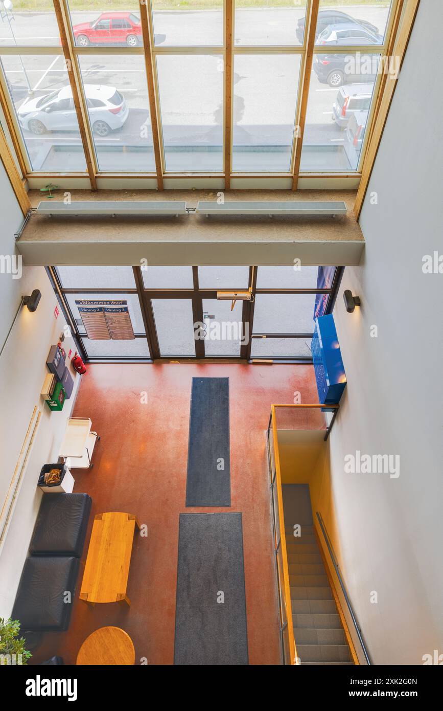 Close-up top-down view of office building entrance with view through ...