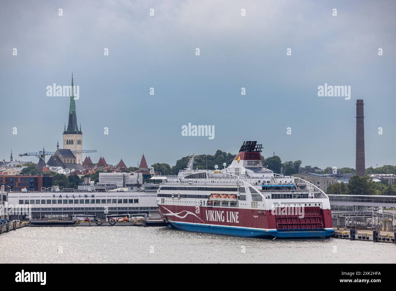 Cruise ship moored in Tallinn Harbor with city skyline behind Stock ...