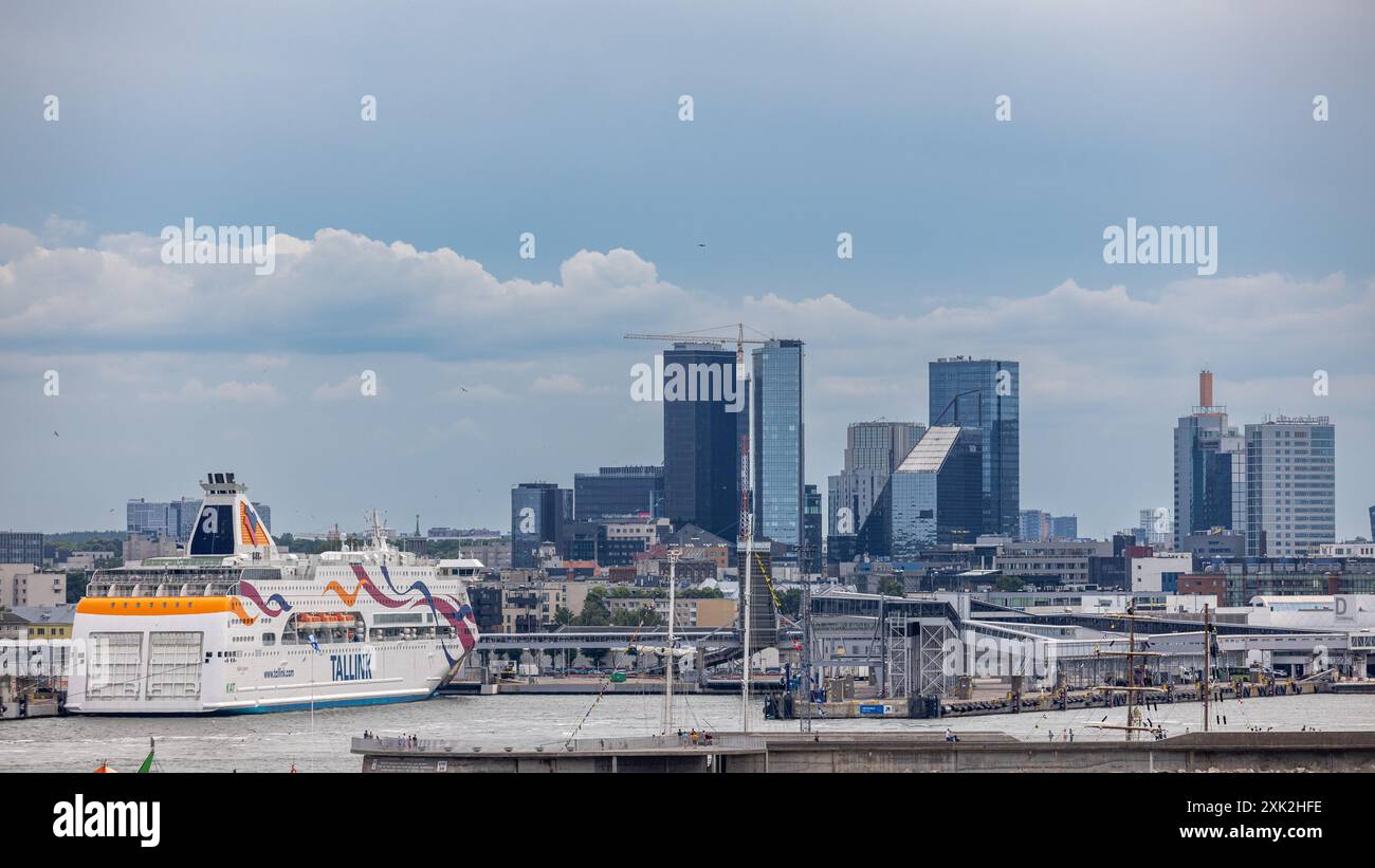 Cruise ship moored in Tallinn Harbor with city skyline behind Stock ...