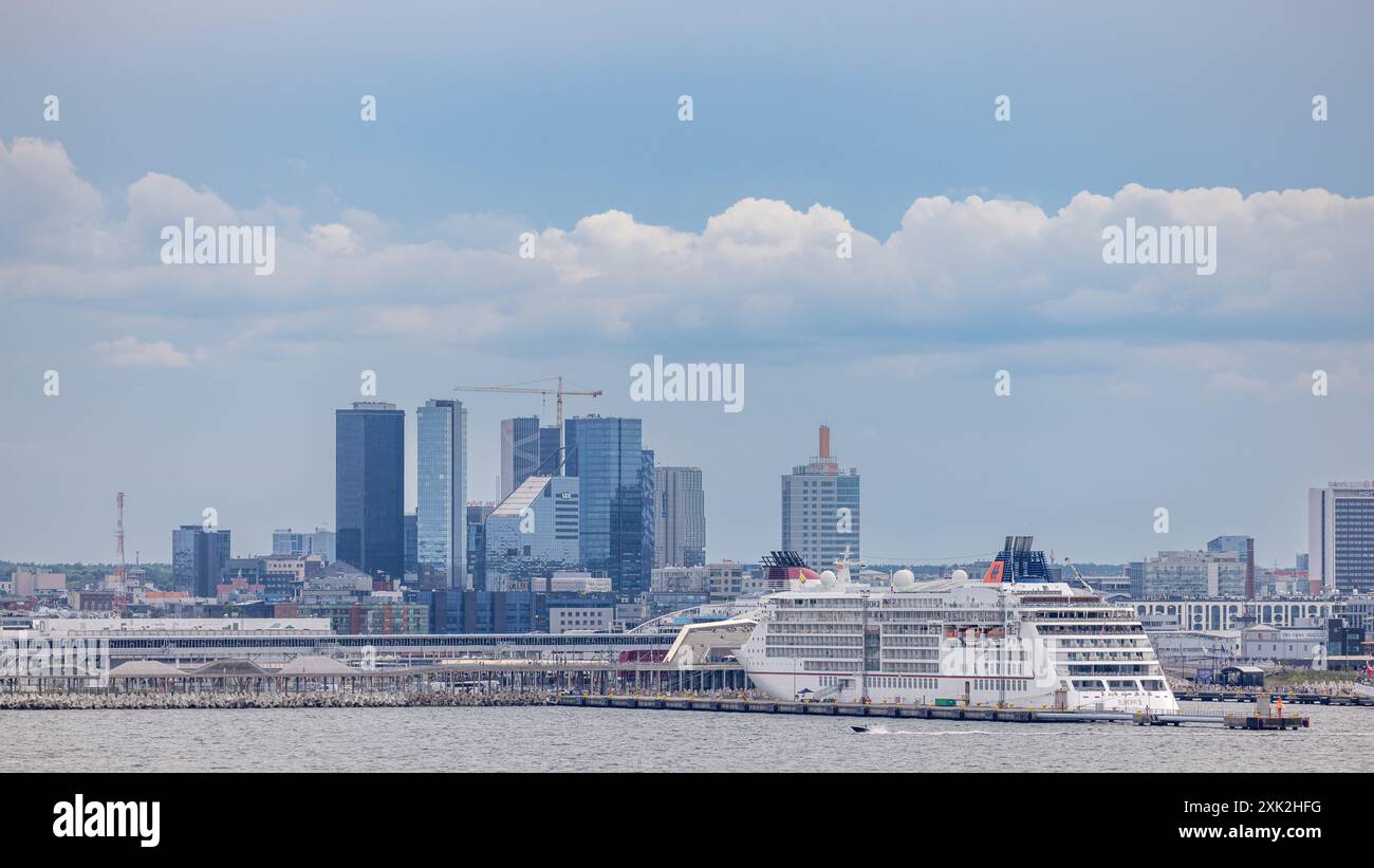 Cruise ship moored in Tallinn Harbor with city skyline behind Stock ...
